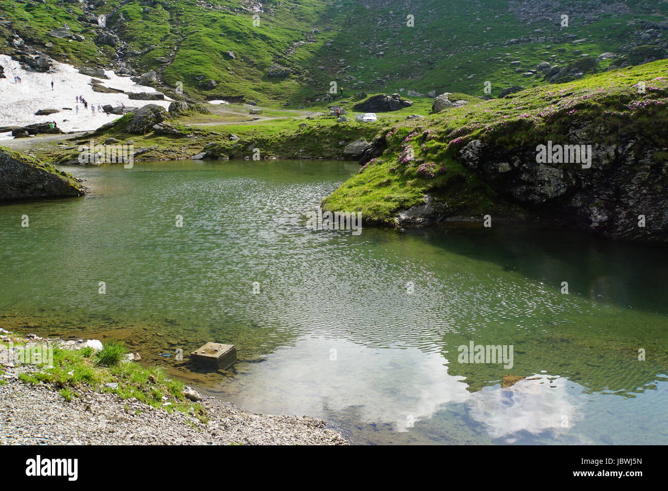 Balea Lac Chalet over Balea glacier Lake next to Transfagarasan Road in ...