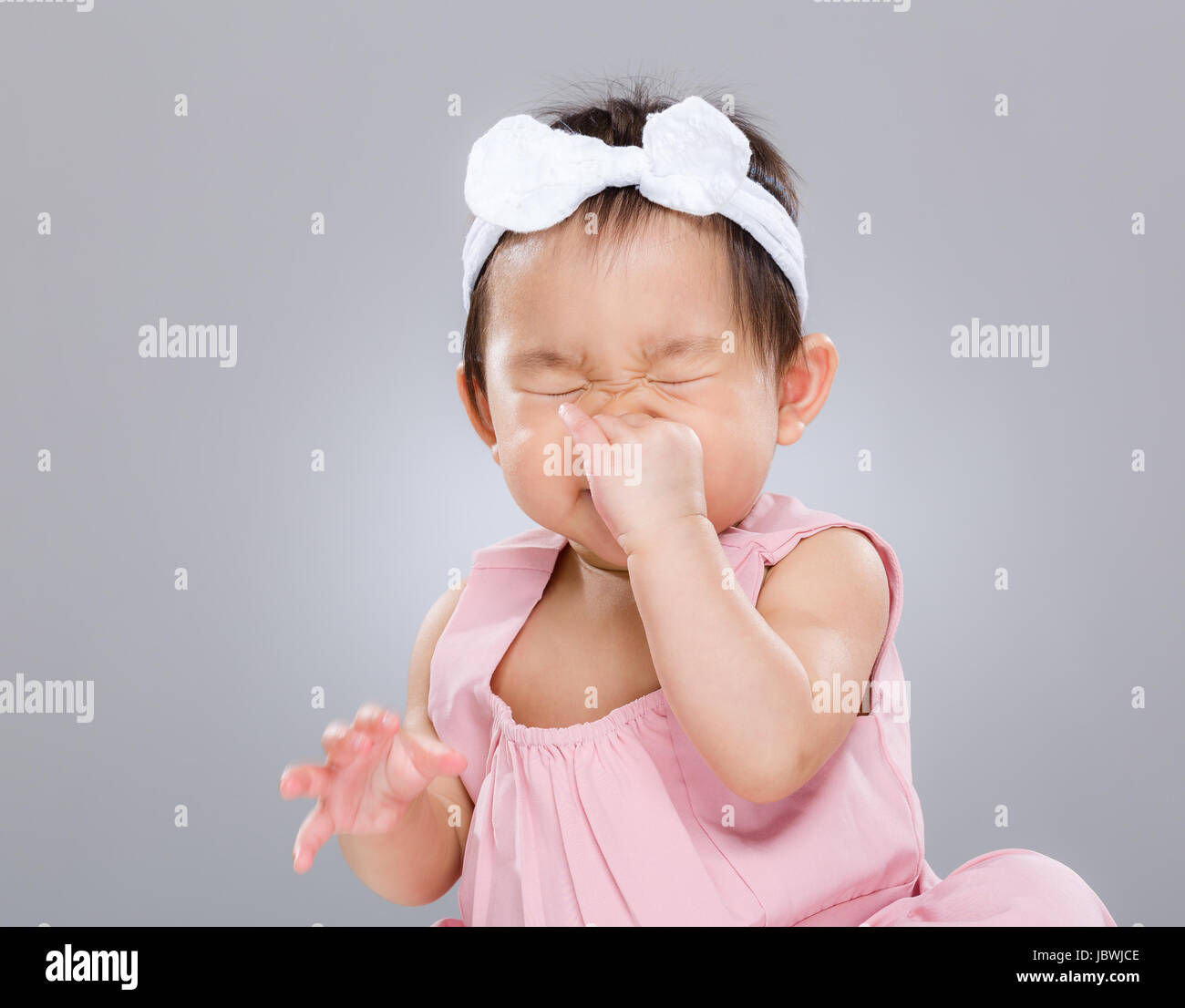 Adorable asian girl pick nose hi-res stock photography and images - Alamy