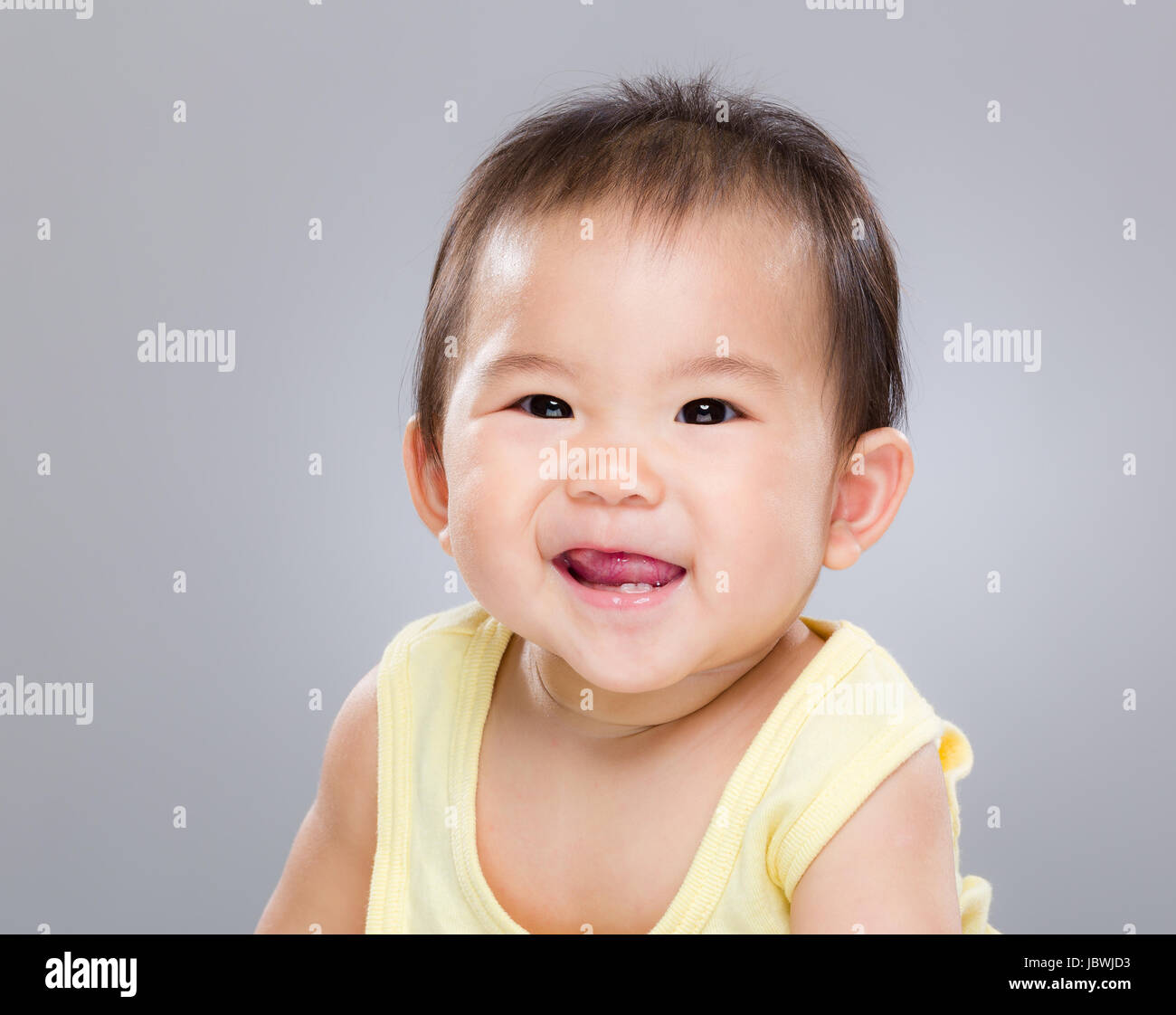 Chinese girl showing tongue hi-res stock photography and images - Alamy