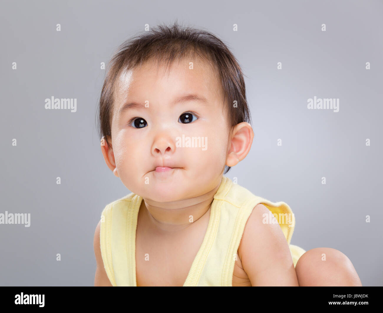 Baby girl pout lip Stock Photo - Alamy