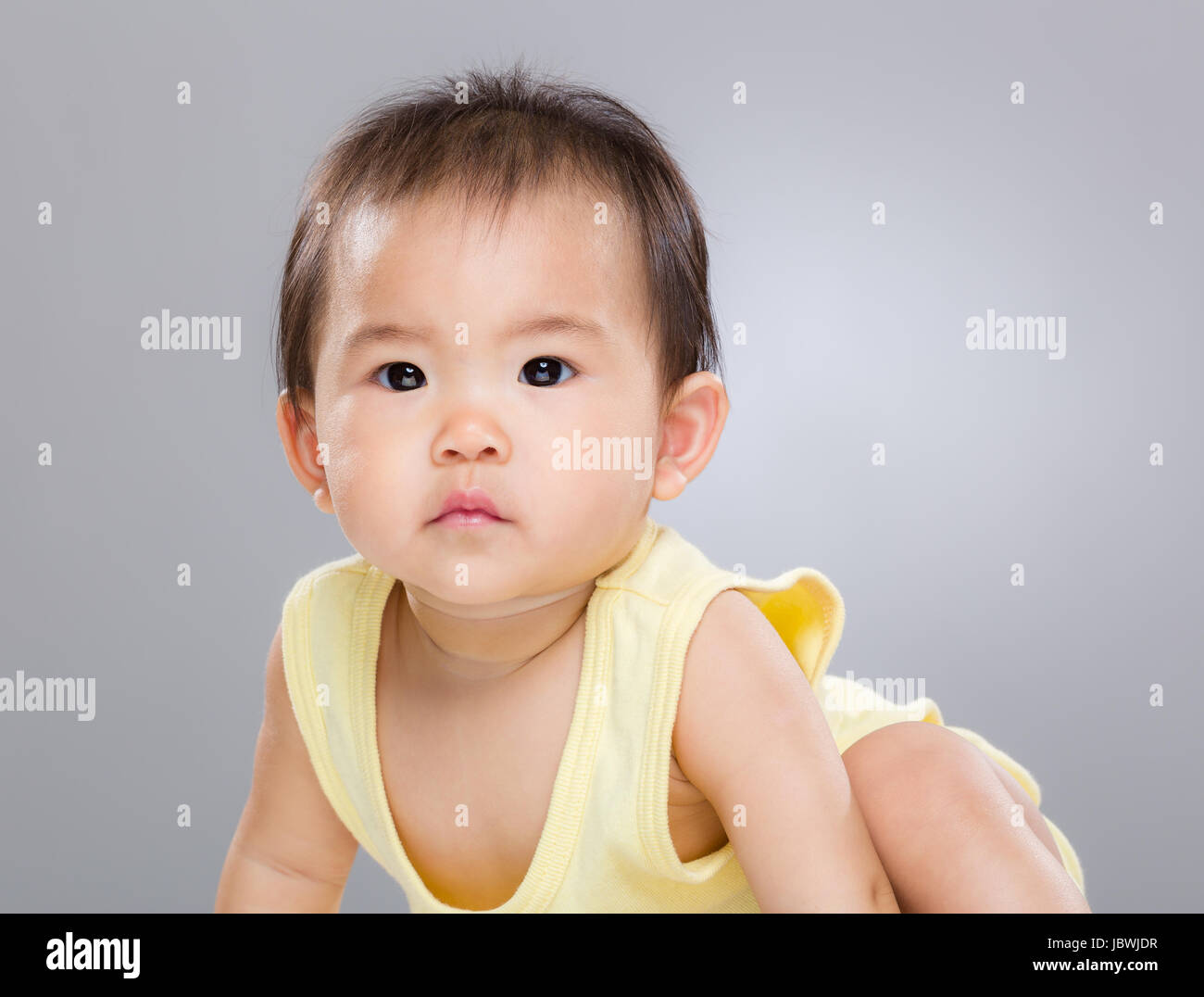 Serious asian baby girl Stock Photo - Alamy