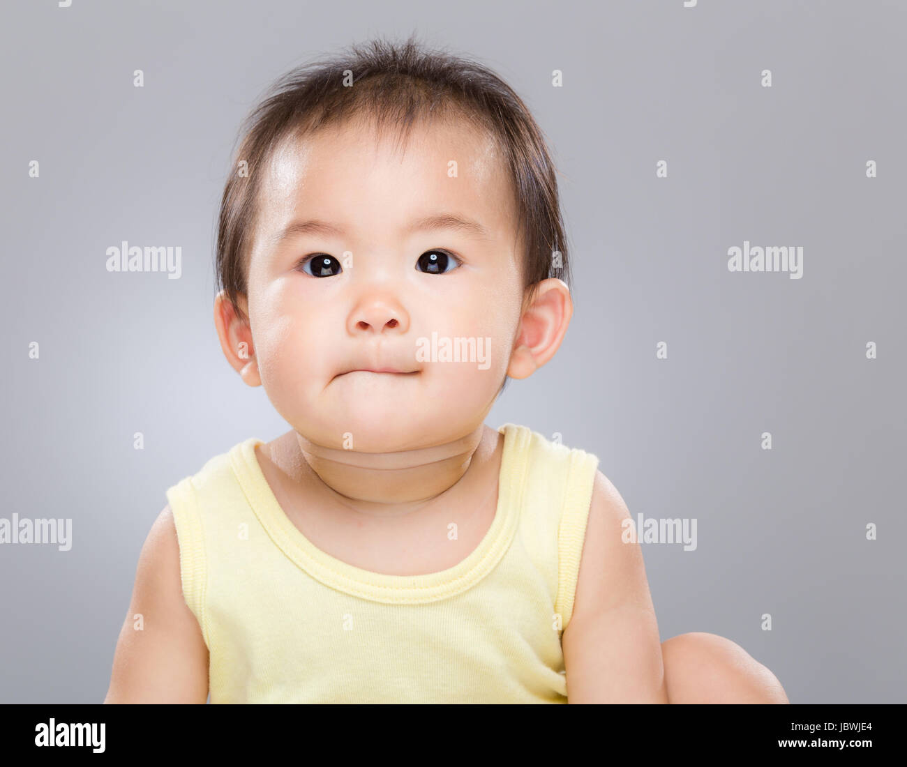 Cute chinese baby girl thinking hi-res stock photography and images - Alamy