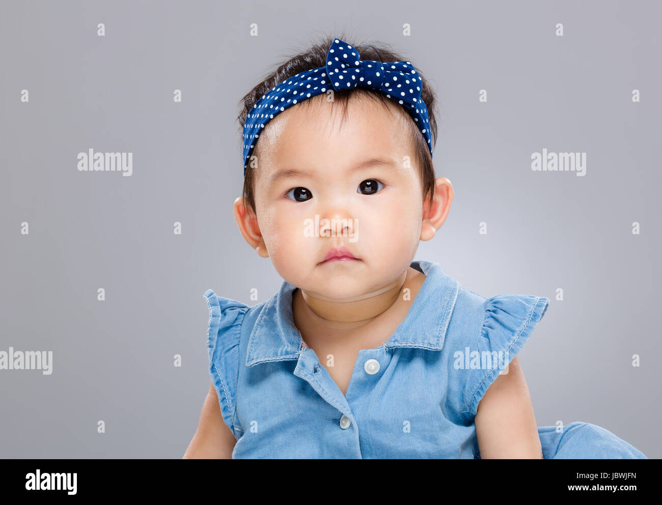 Cute chinese baby girl thinking hi-res stock photography and images - Alamy