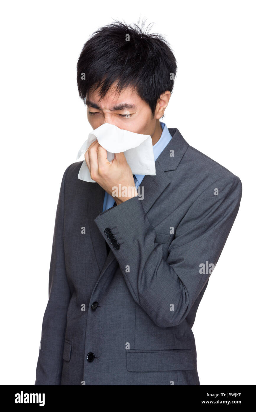 Asian businessman get cold Stock Photo - Alamy