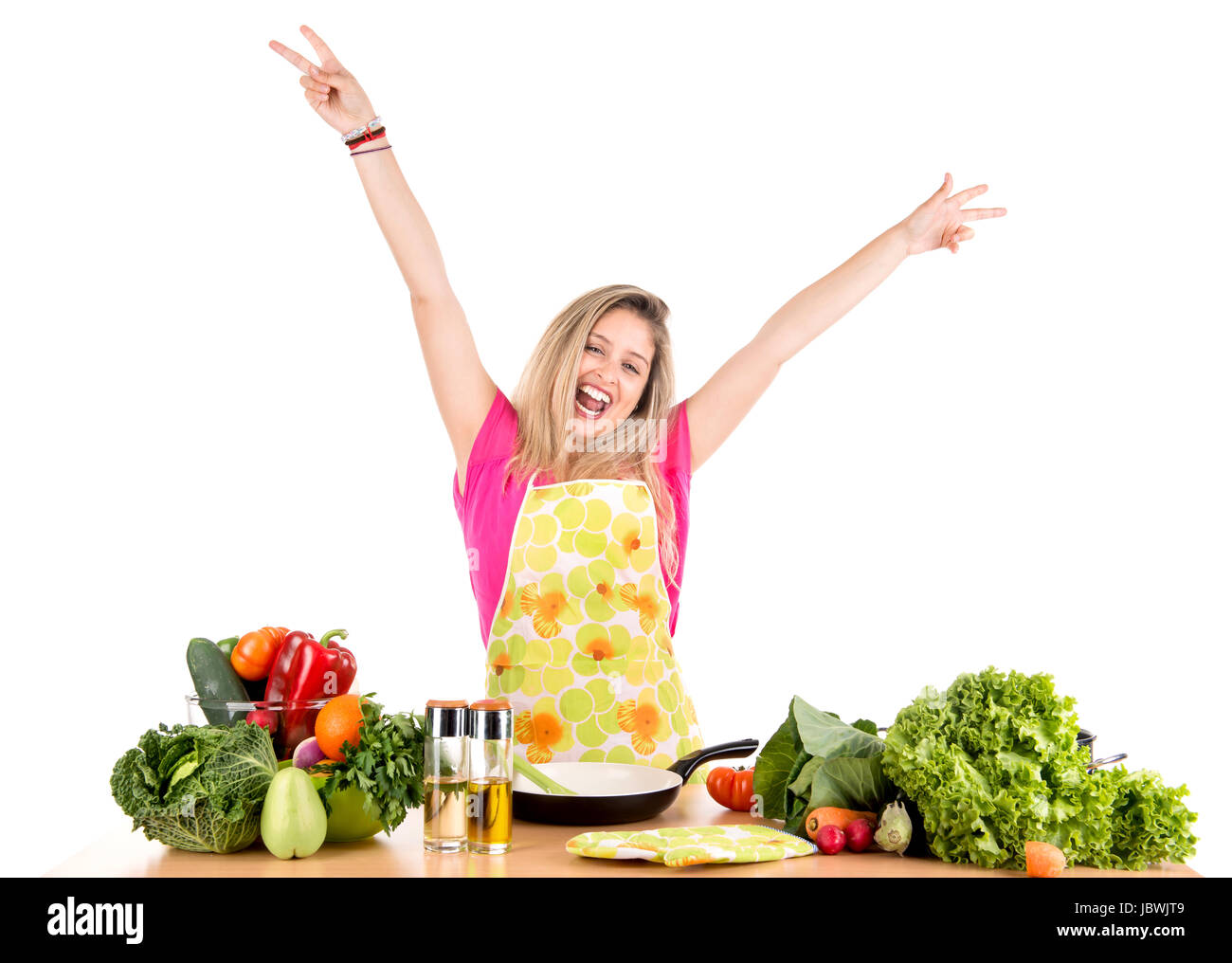 Beautiful woman cooking in the kitchen Stock Photo - Alamy