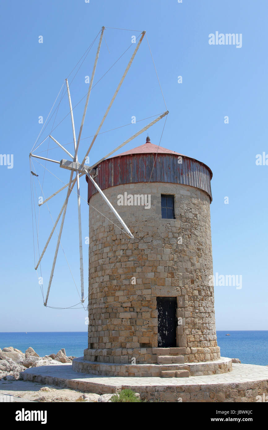 old windmill on the pier of rhodes,greece Stock Photo - Alamy