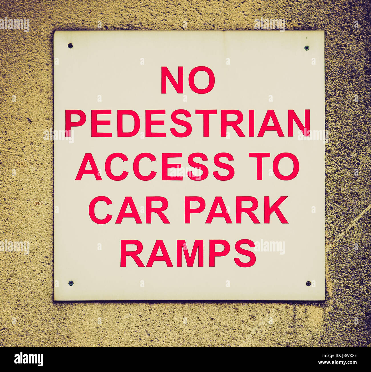 Vintage retro looking No pedestrian access to car park ramps sign Stock ...
