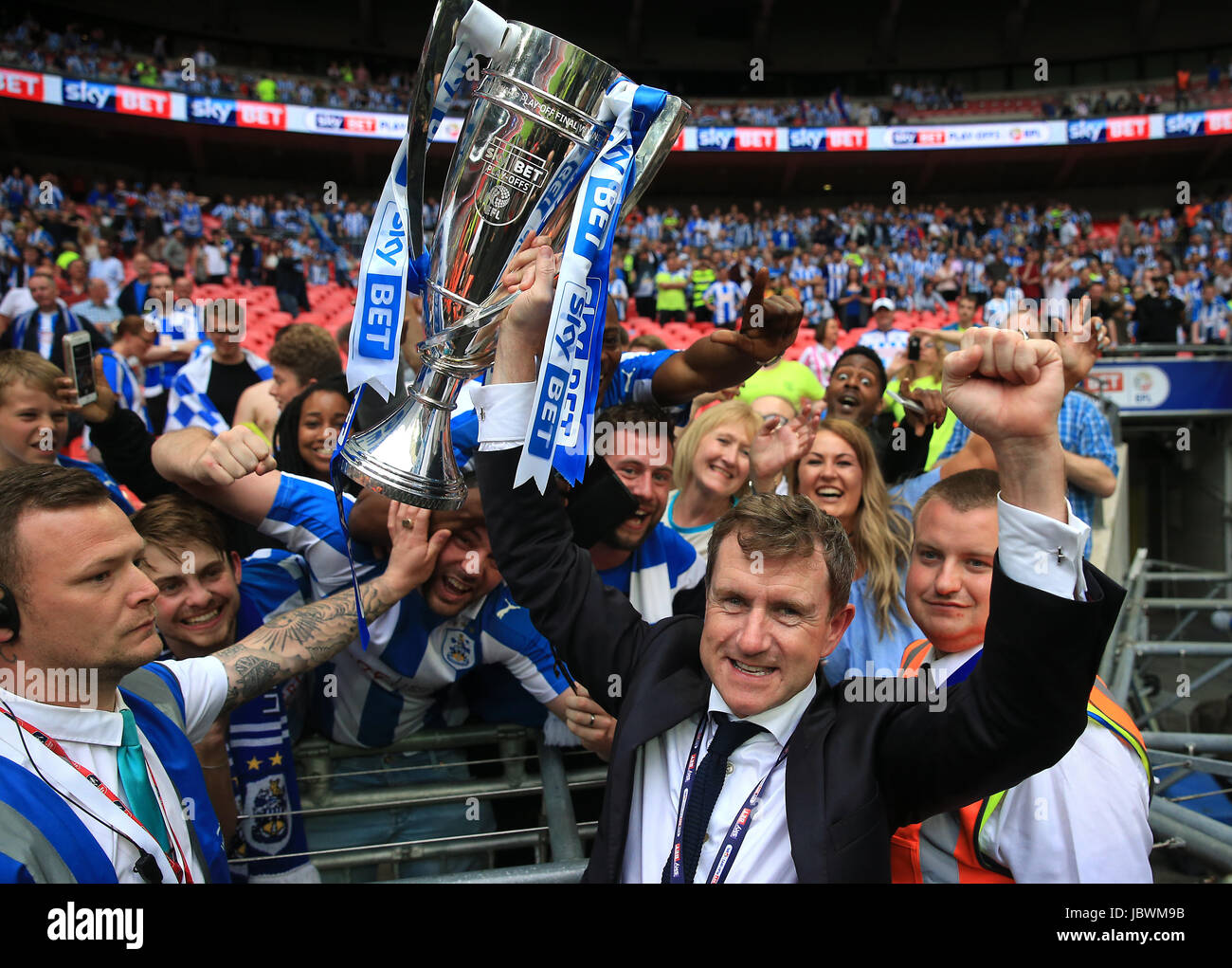 Huddersfield Town chairman Dean Hoyle with the trophy after winning the ...