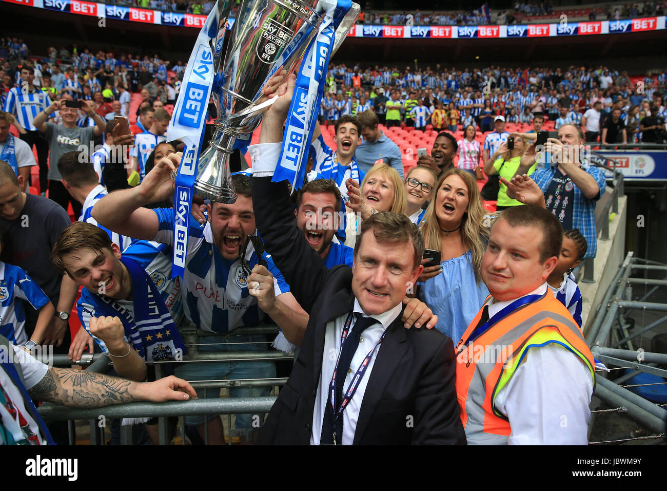 Huddersfield Town chairman Dean Hoyle with the trophy after winning the ...