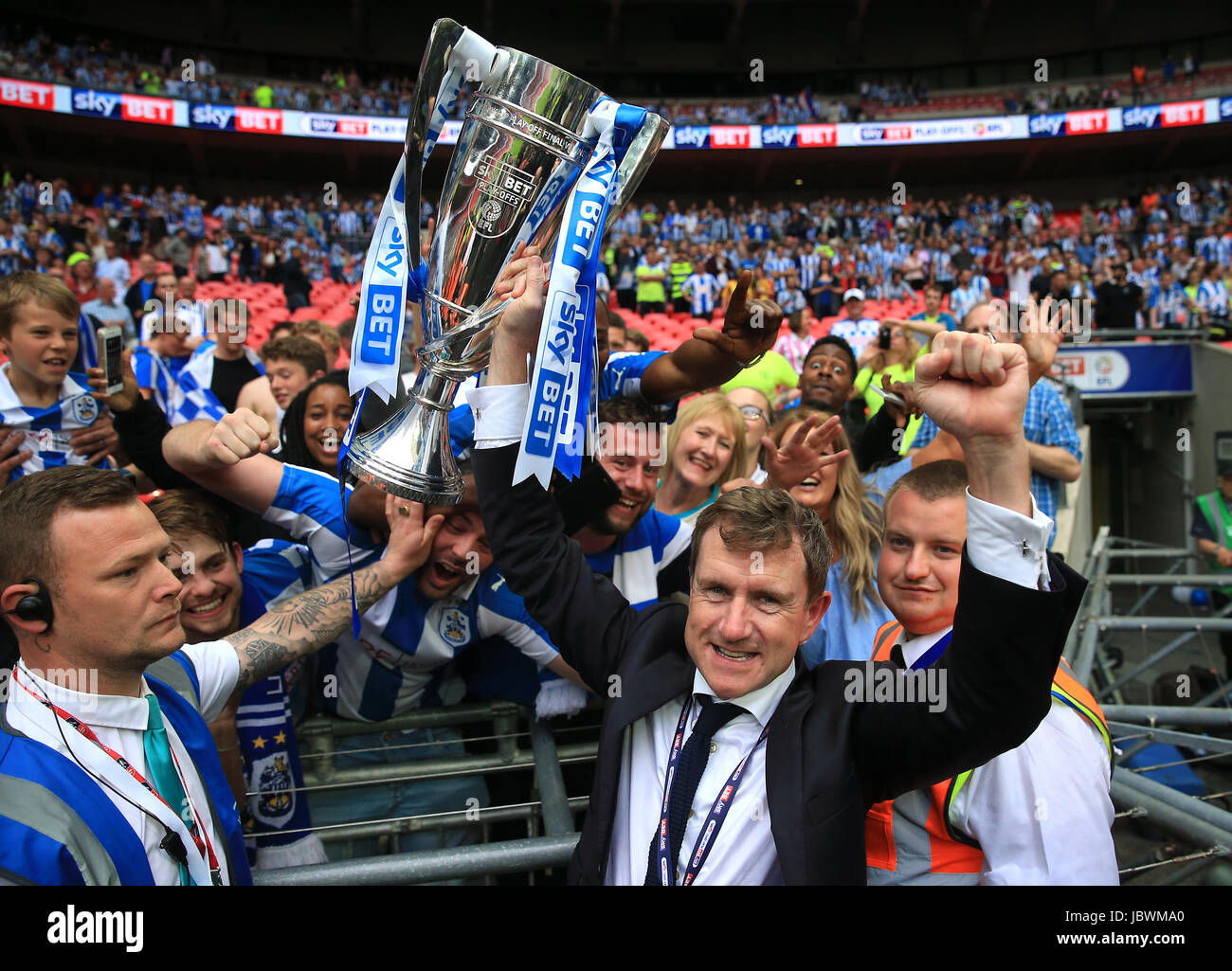 Huddersfield Town chairman Dean Hoyle with the trophy after winning the ...