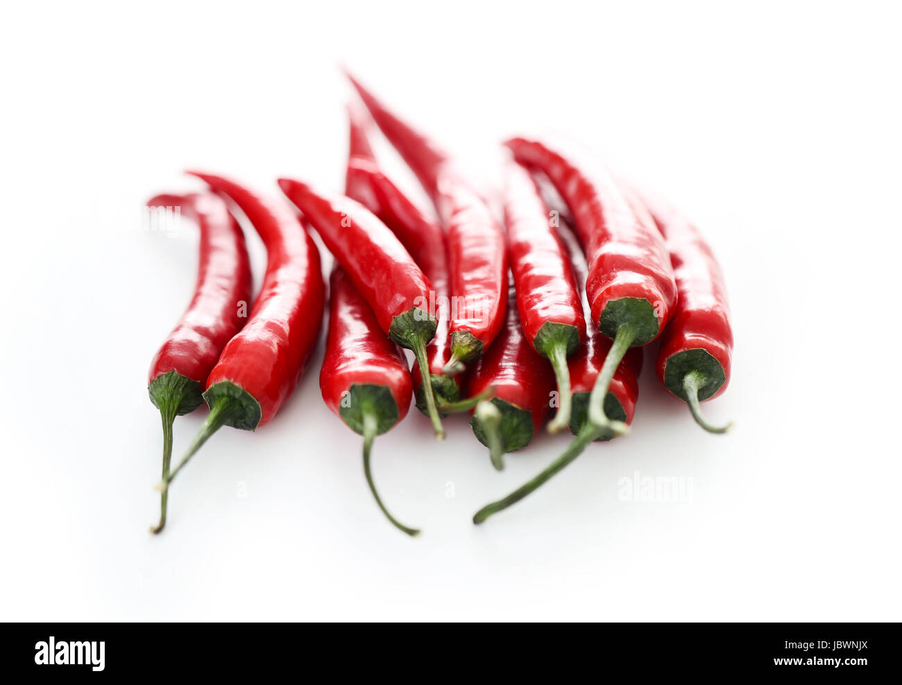 Red chili pepper on a white background Stock Photo - Alamy
