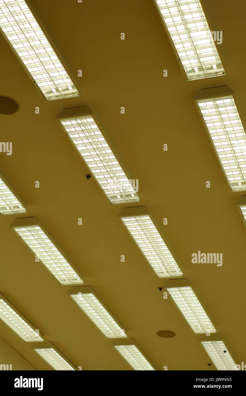 Rows of fluorescent lamps of office ceiling Stock Photo - Alamy