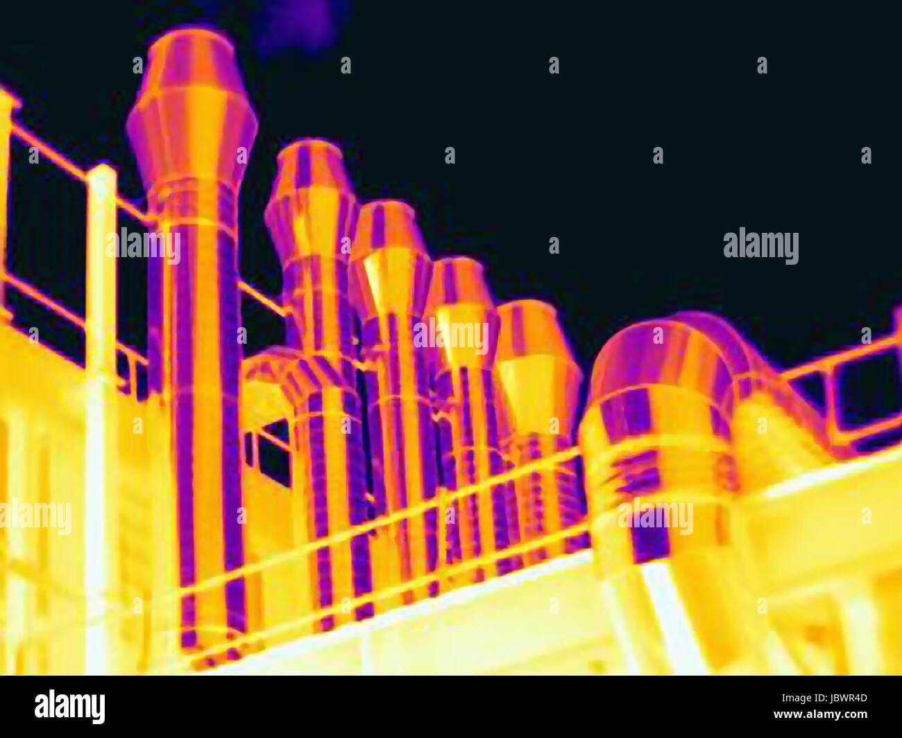 Thermal image of industrial building and smoke stacks Stock Photo - Alamy