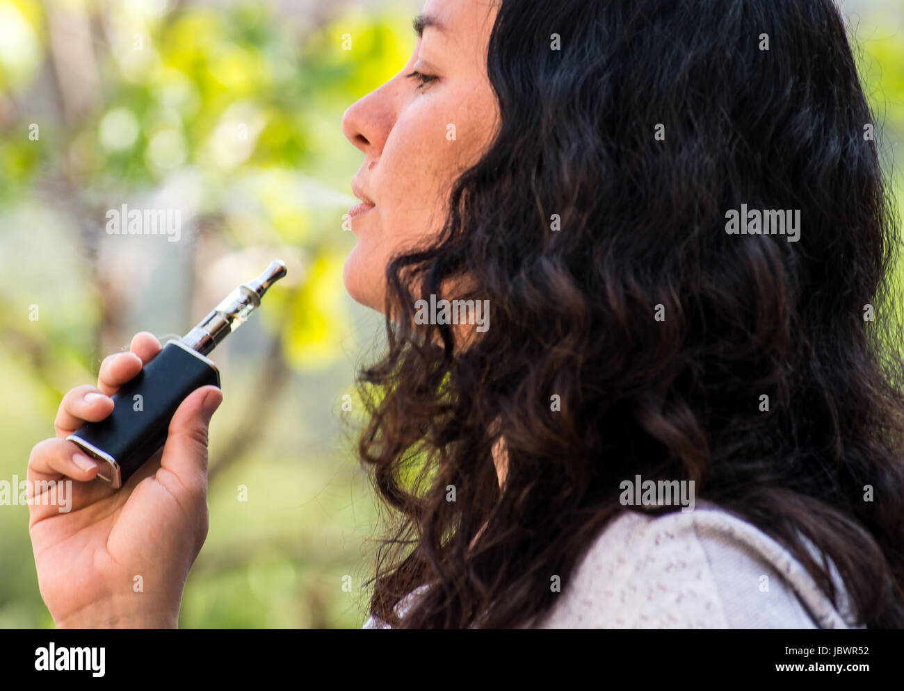 Mature woman smoking hi-res stock photography and images - Alamy