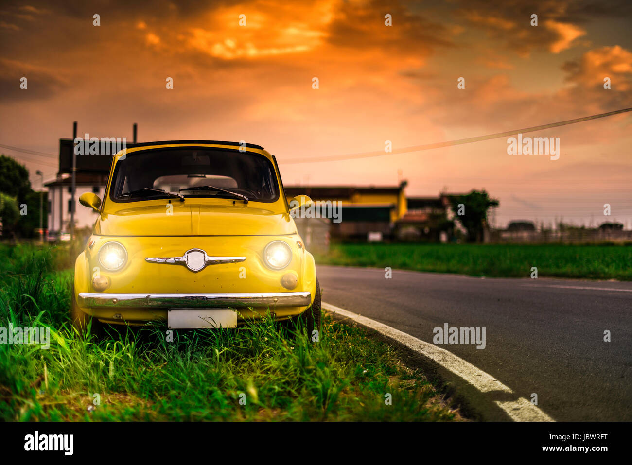 Small vintage italian car Fiat Abarth. Yellow color Stock Photo - Alamy