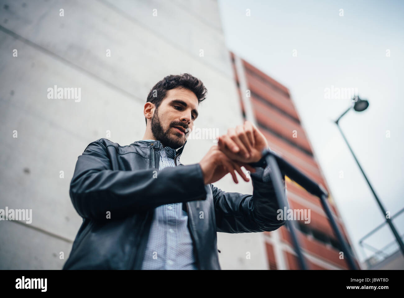 Man checking time, Florence, Italy Stock Photo - Alamy