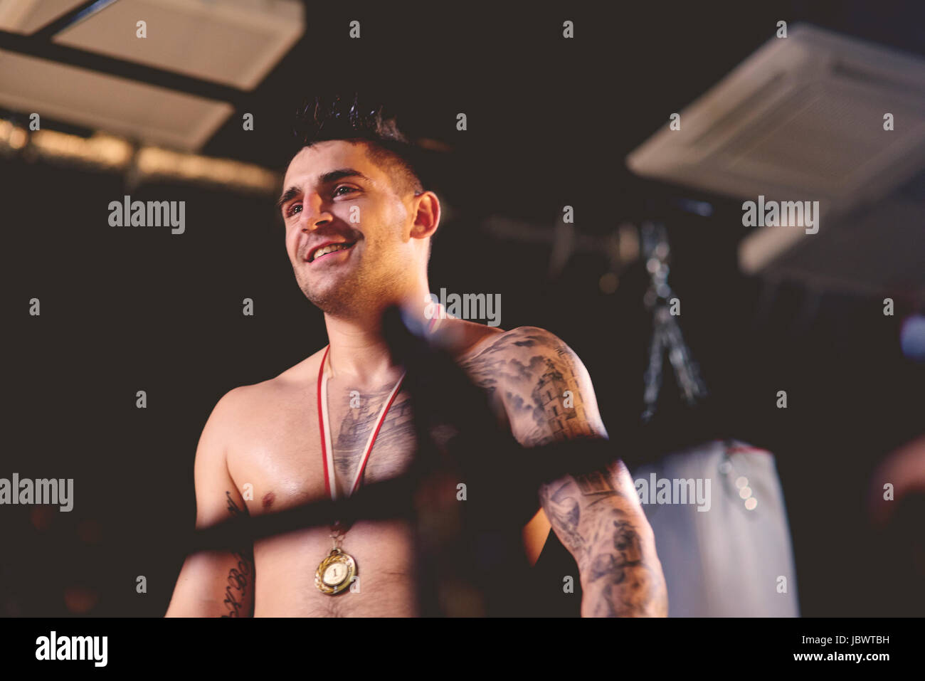 Boxing champion with medal Stock Photo - Alamy