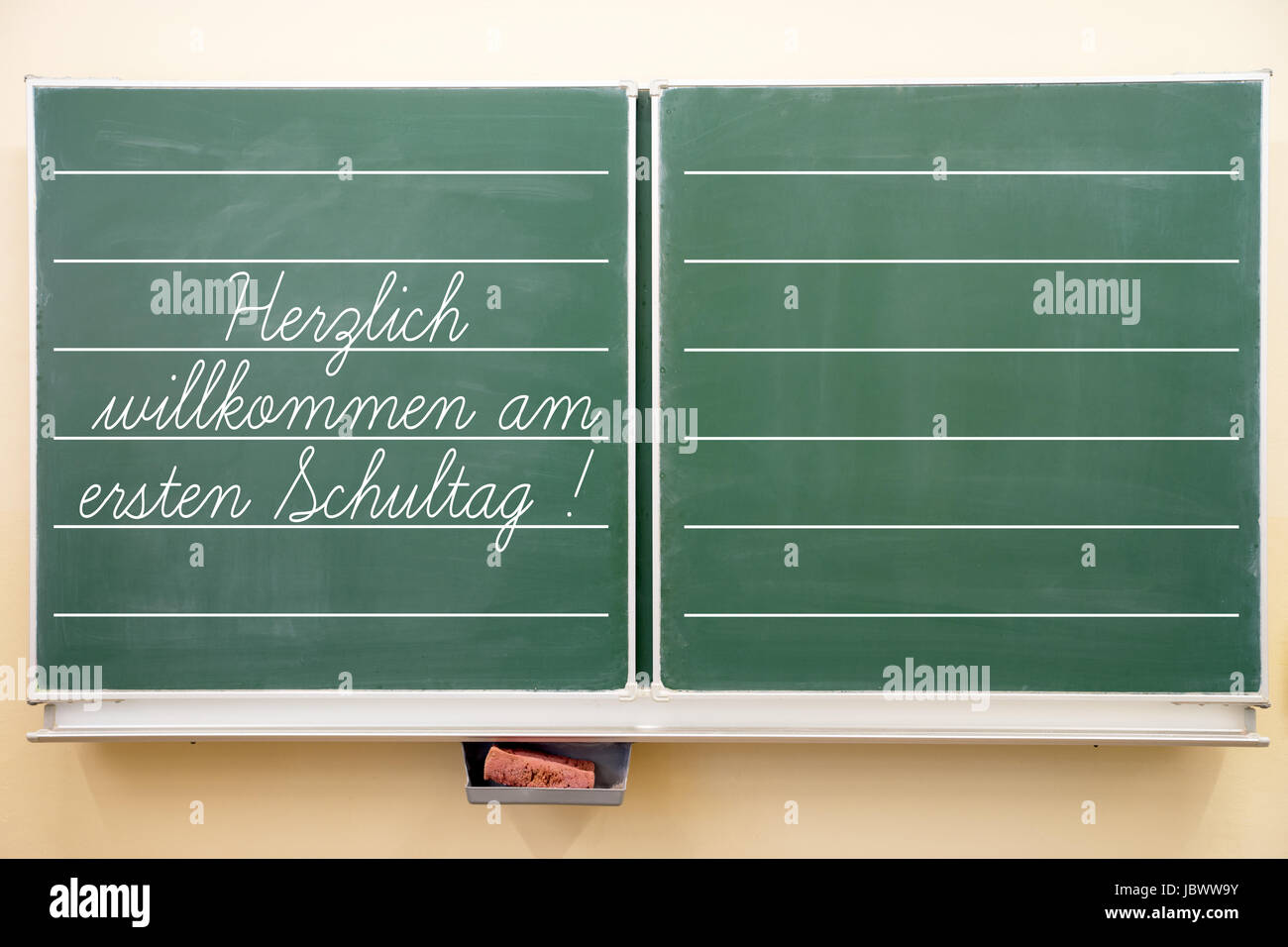 school blackboard with the german words Welcome to the first day of ...
