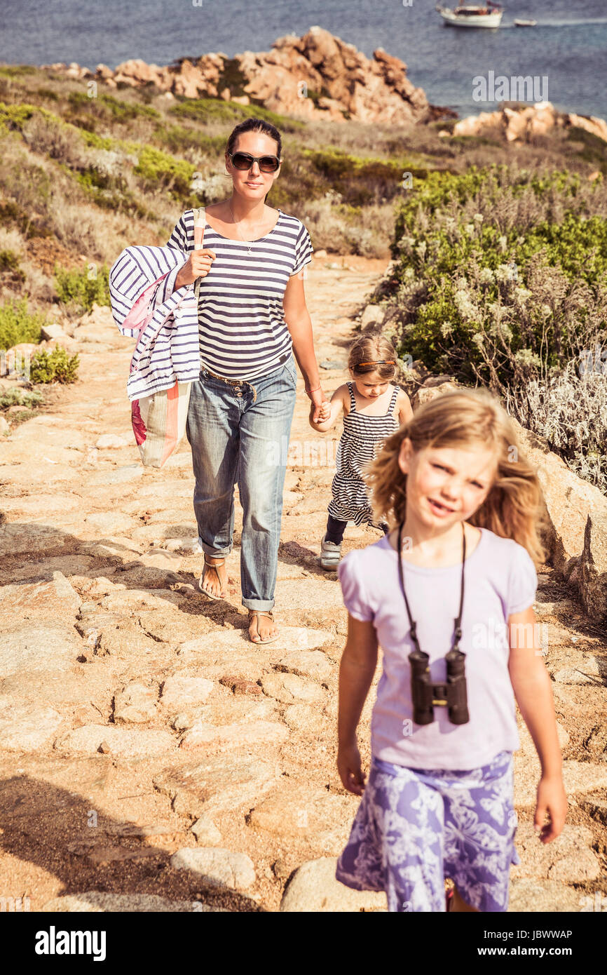 Mother walking with children, near beach Stock Photo - Alamy