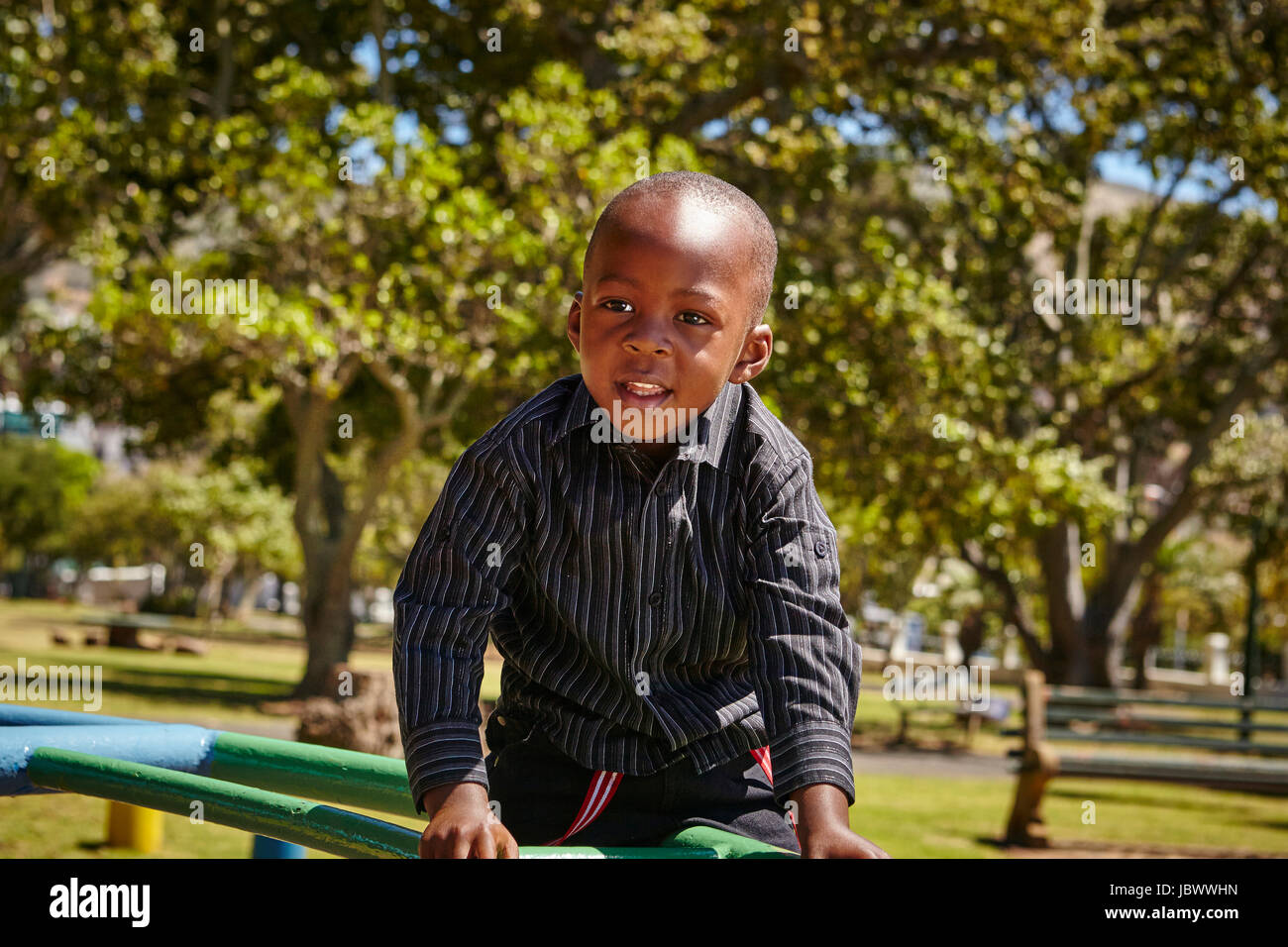 African boy climbing tree hi-res stock photography and images - Alamy