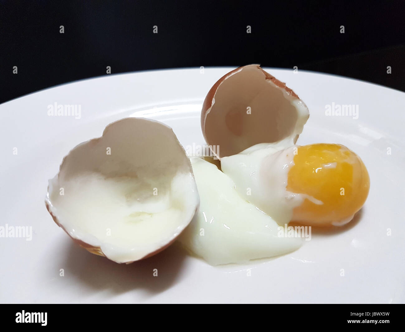 Half Boiled Eggs Stock Photo - Alamy