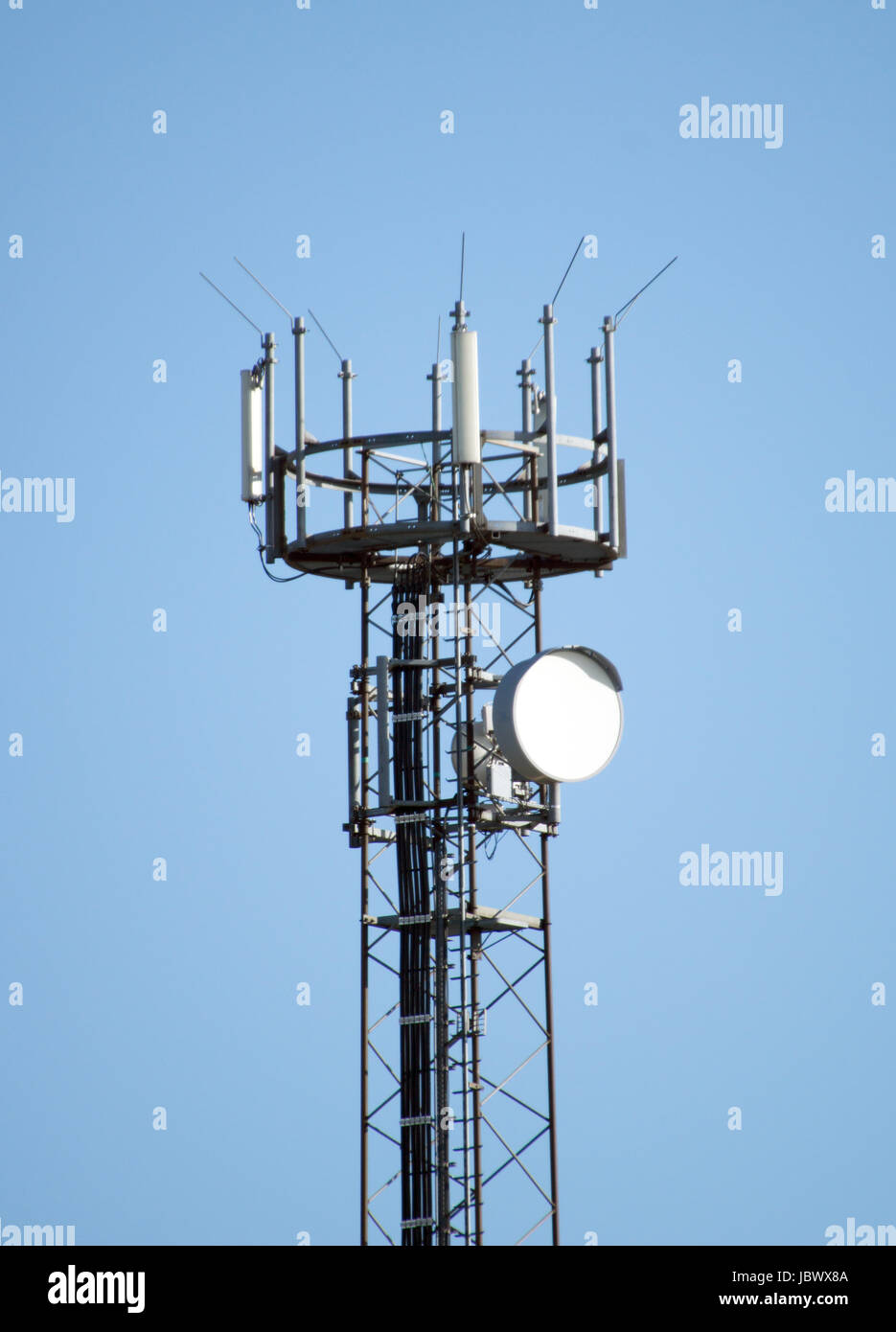 Wireless Mast and blue sky Stock Photo - Alamy