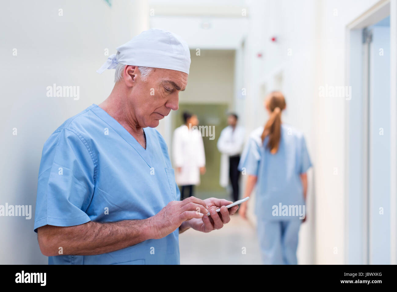 Caucasian male doctor wearing phone hi-res stock photography and images ...