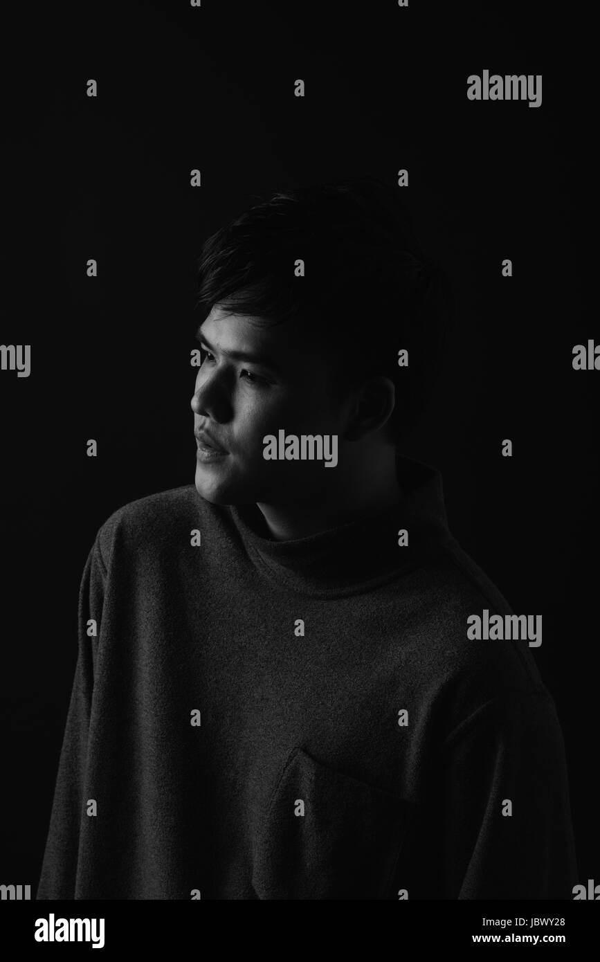 Portrait of sad young asian men. Sadness Stock Photo - Alamy