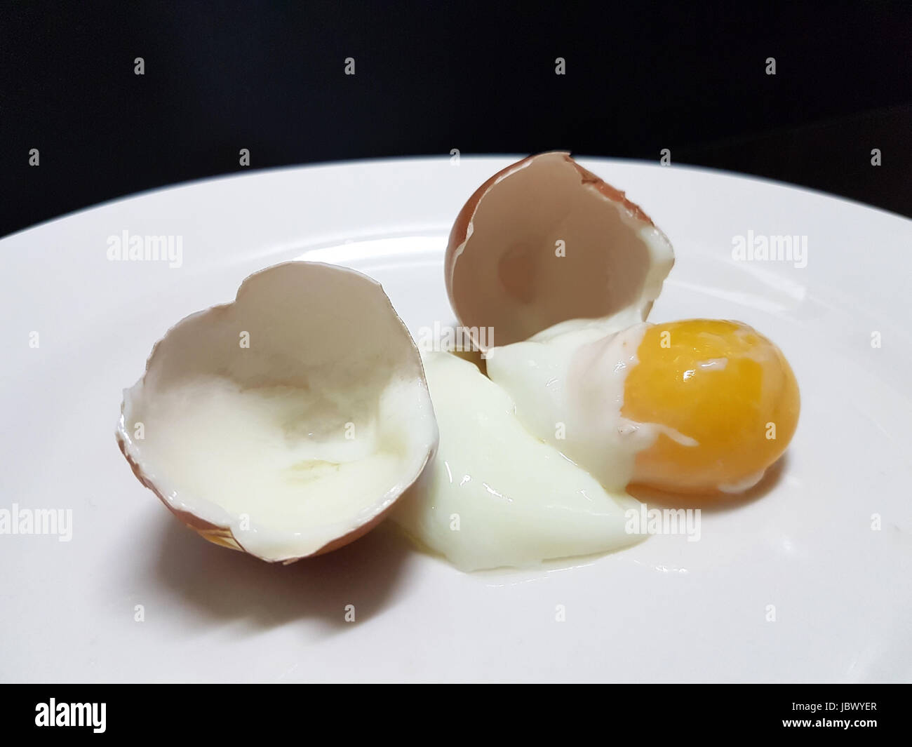 Half Boiled Eggs Stock Photo - Alamy
