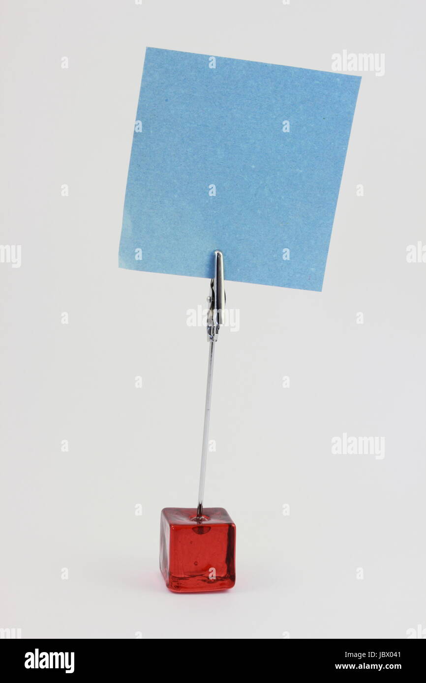 Red glass note-holder with alligator clip and blank blue note Stock ...