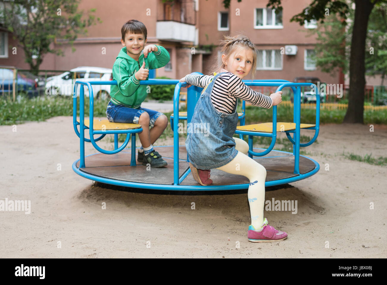 Boy turning round hi-res stock photography and images - Alamy
