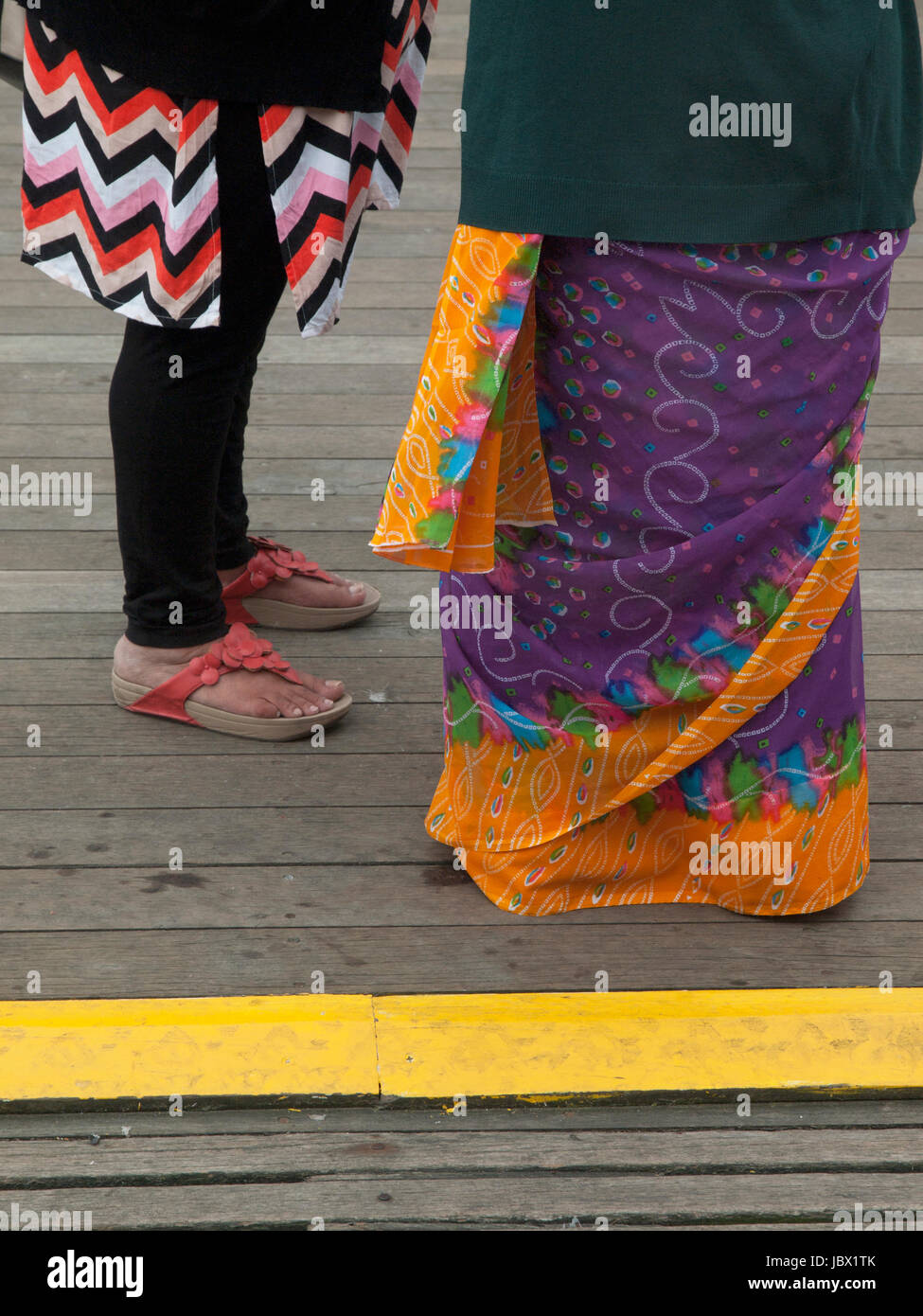 Loud colorful clothes on Brighton Pier Stock Photo - Alamy