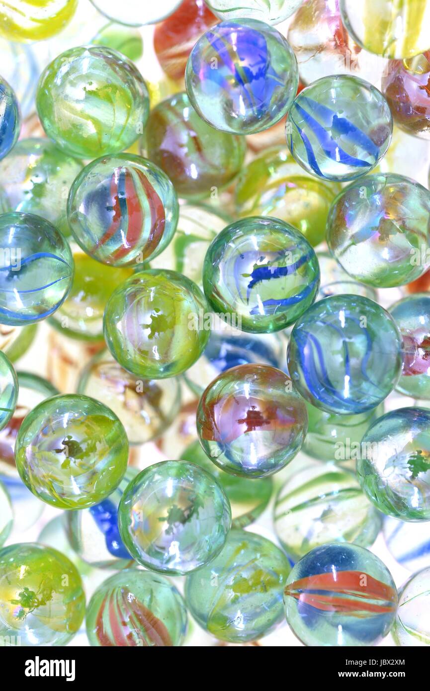 A close up shot of glass marbles Stock Photo - Alamy