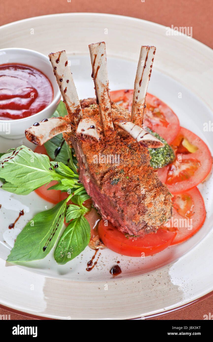 roasted lamb rib chops with vegetables Stock Photo - Alamy