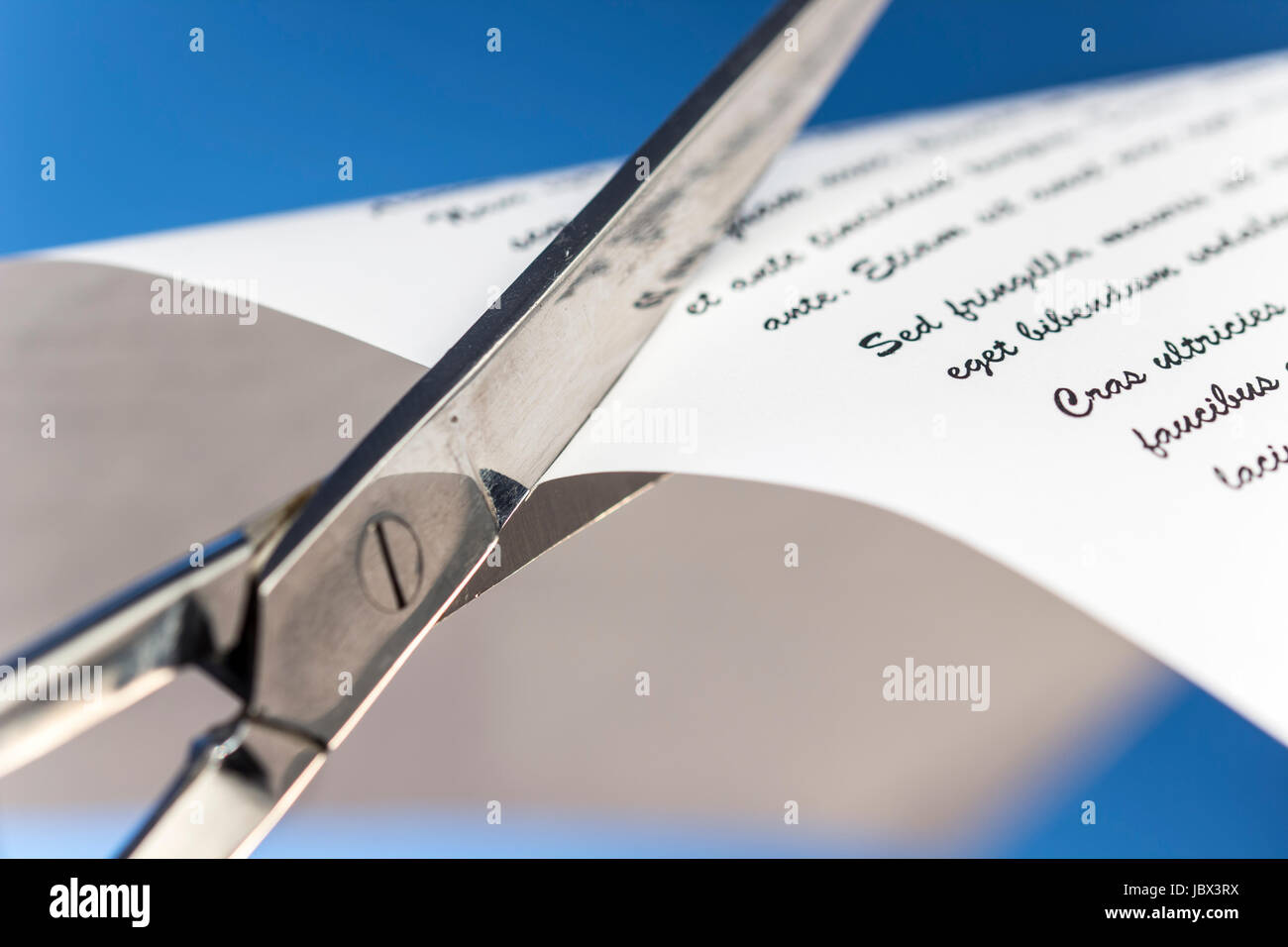 Cutting up paper hi-res stock photography and images - Alamy