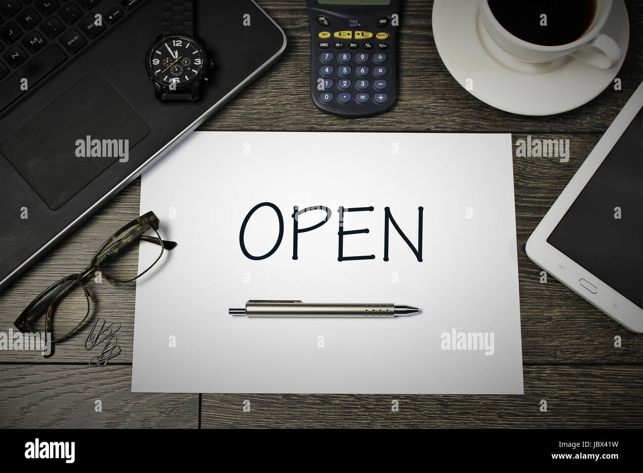 An image of writing desk, with a sheet of paper Stock Photo - Alamy