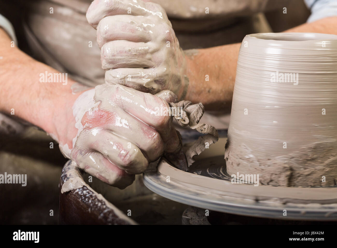 pottery, workshop, ceramics art concept - male hands work with potter's ...