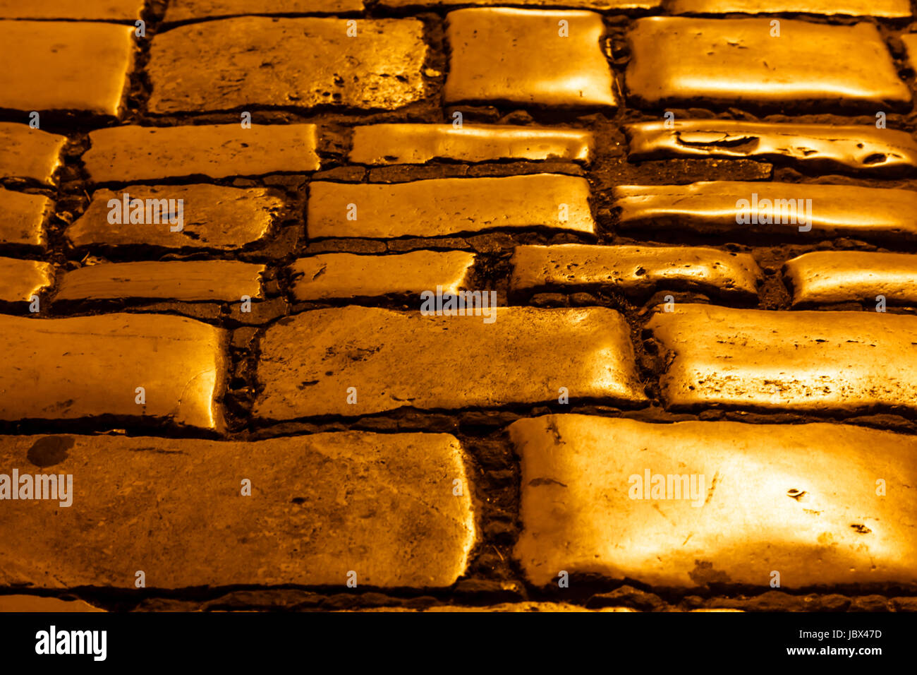 Illuminated Golden Cobblestones of Rovinj, Croatia Stock Photo - Alamy