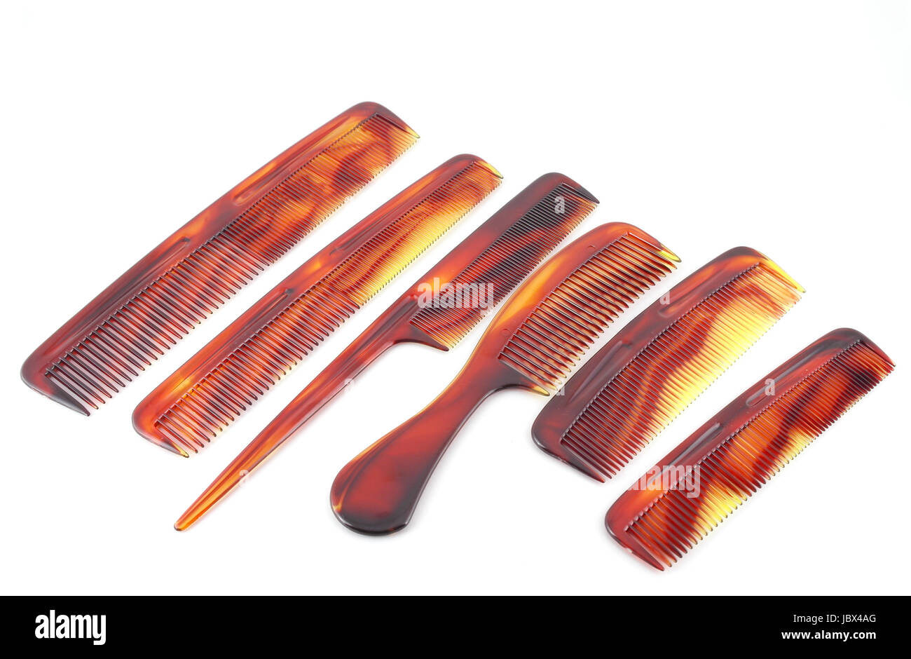 Set of plastic combs over white Stock Photo - Alamy