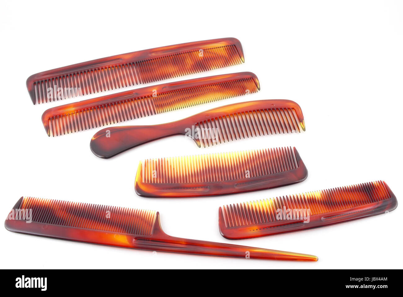 Yellow plastic comb Cut Out Stock Images & Pictures - Alamy