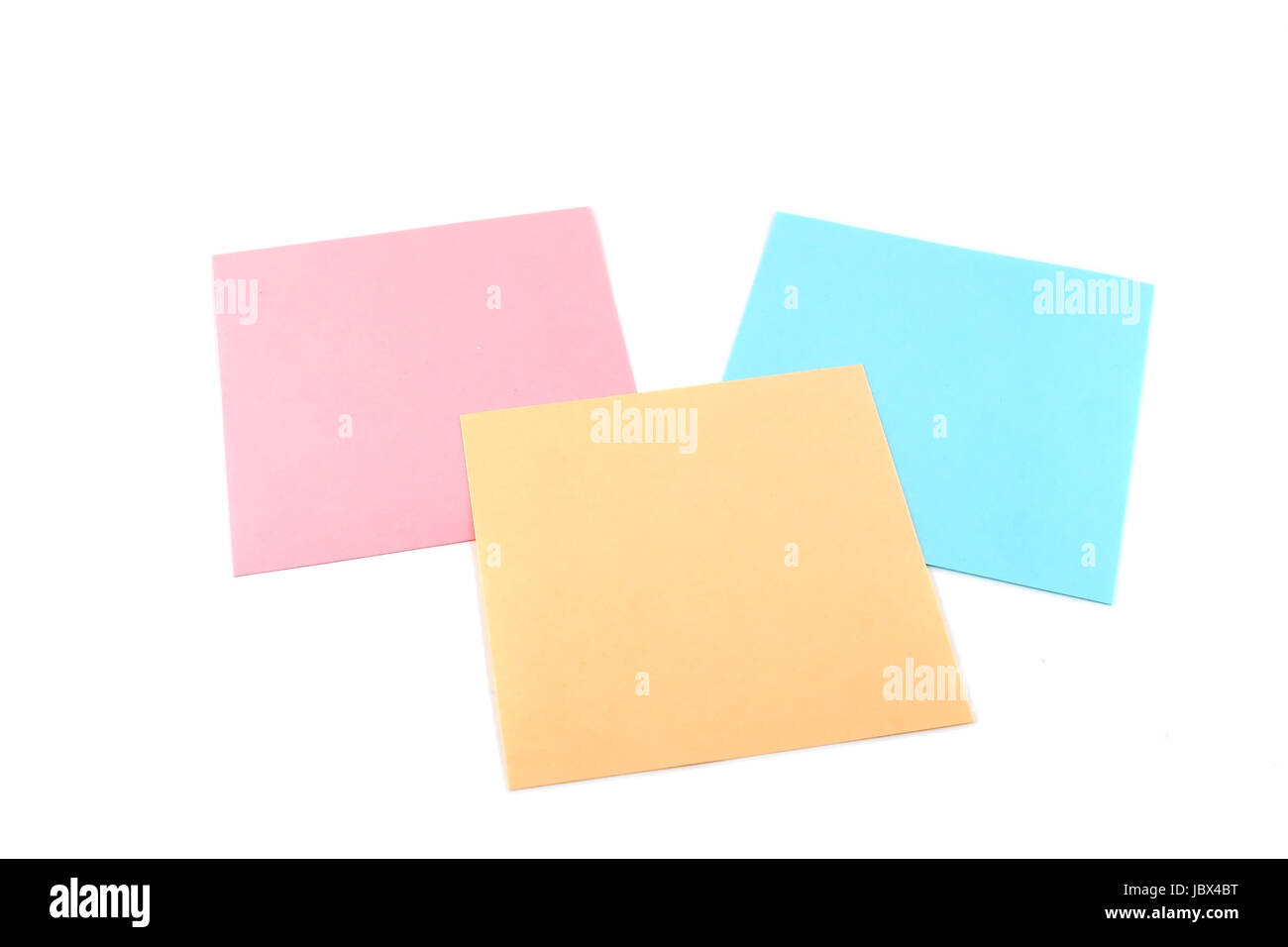 Three color reminder notes over white Stock Photo - Alamy