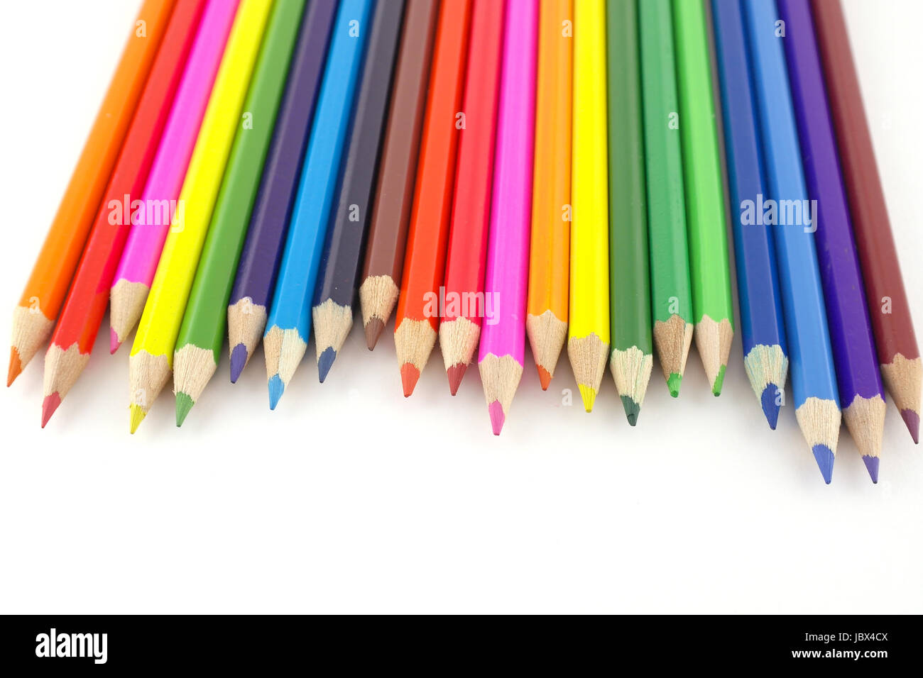 Multi color pencils over white Stock Photo - Alamy