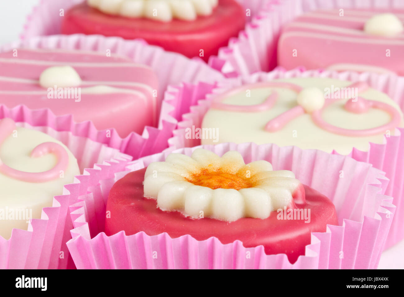 pink petit fours Stock Photo - Alamy