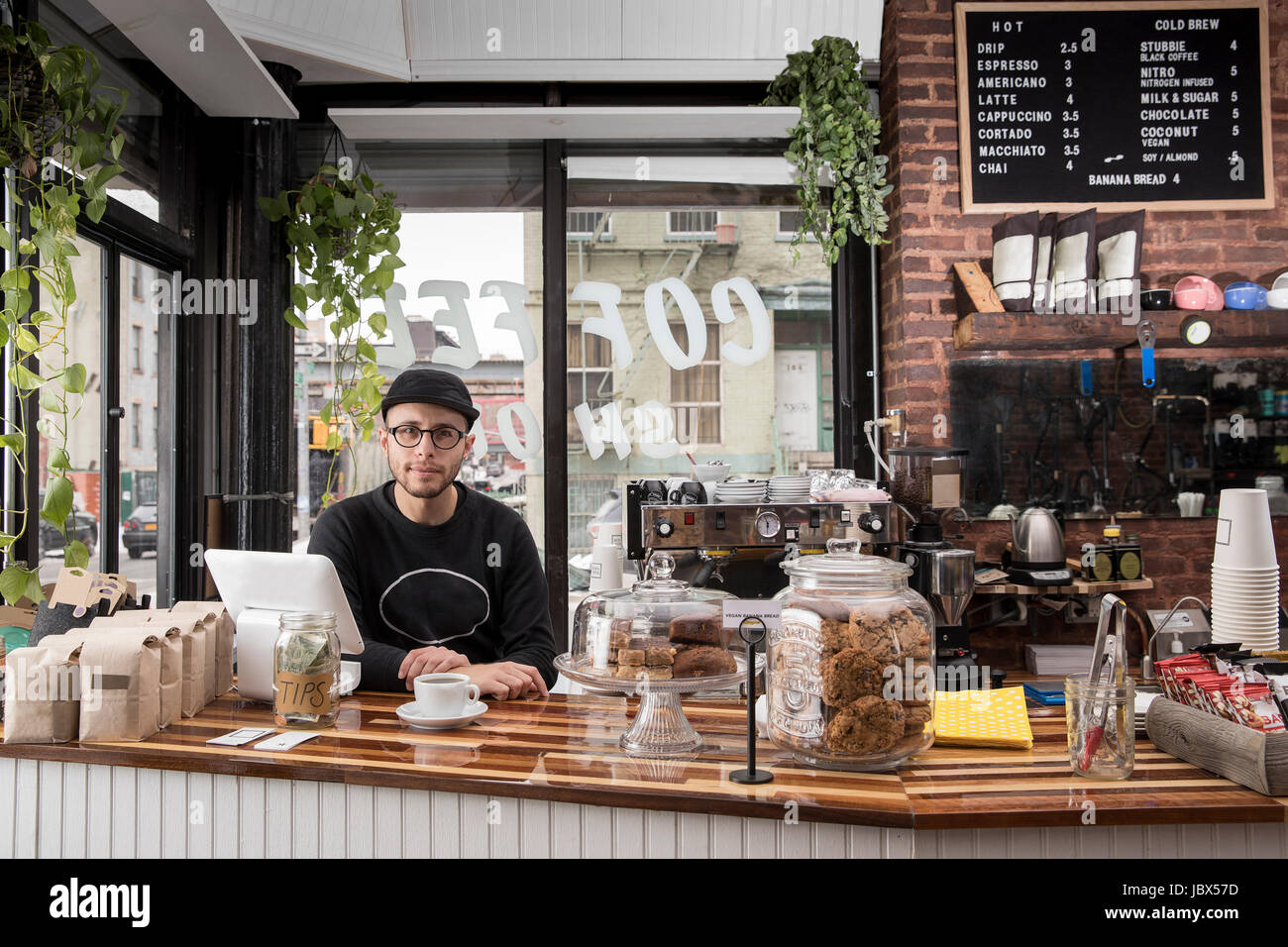 Male employee in cafe, New York, USA Stock Photo - Alamy