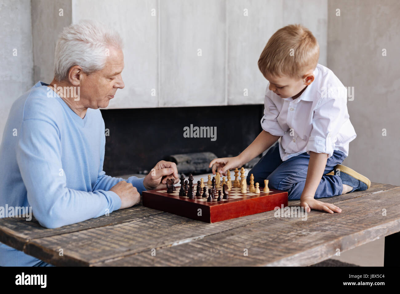 Persistent little kid learning how to play Stock Photo - Alamy