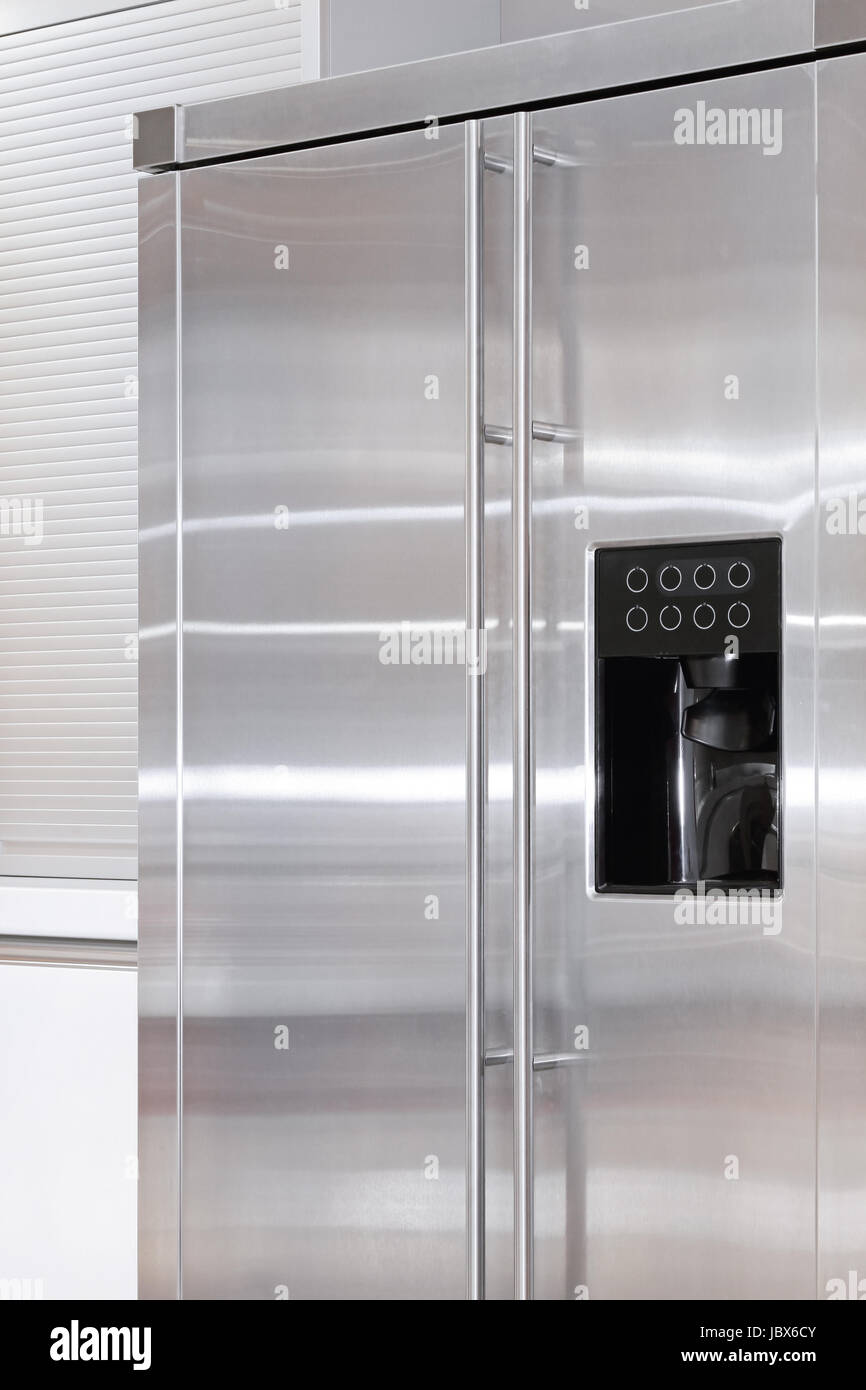 Big silver double fridge in modern kitchen Stock Photo - Alamy