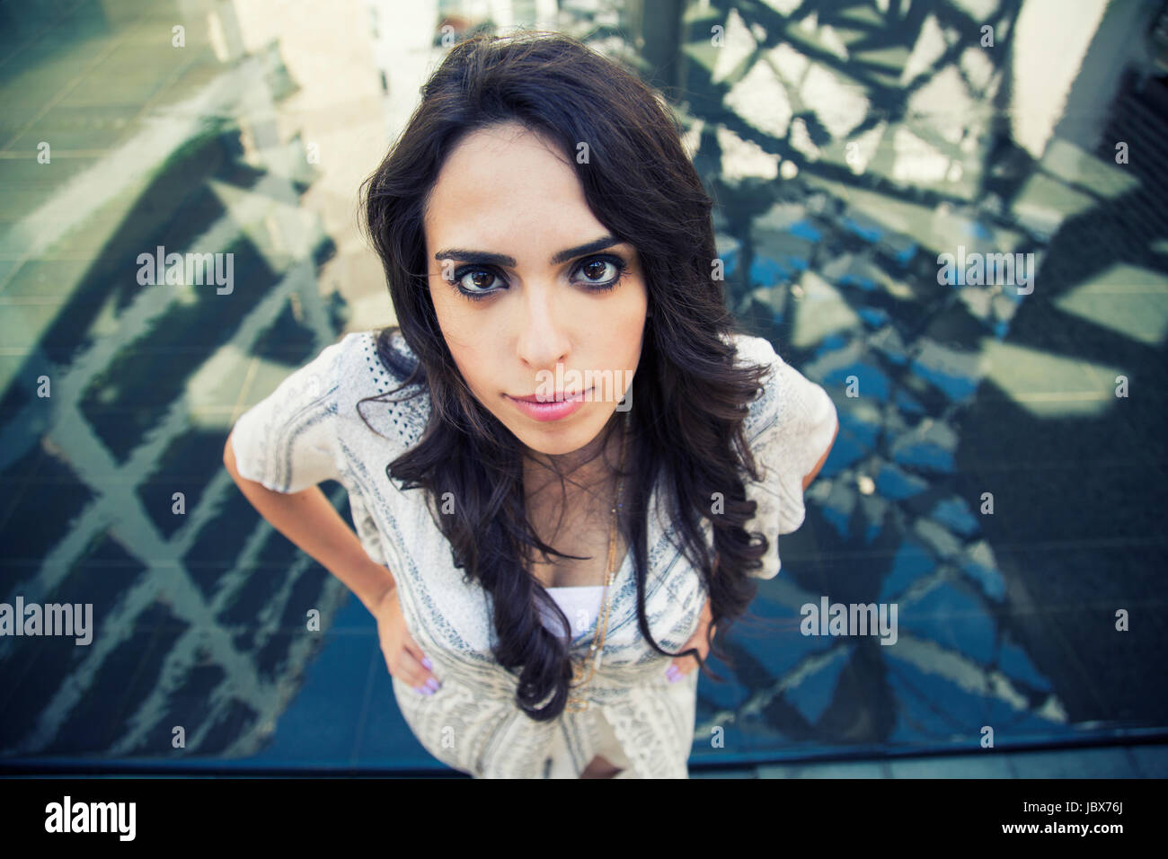 High angle portrait of a young woman outdoors Stock Photo - Alamy