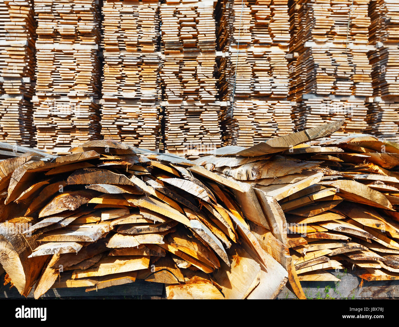 Stack and heap of wooden planks at the lumber yard Stock Photo - Alamy