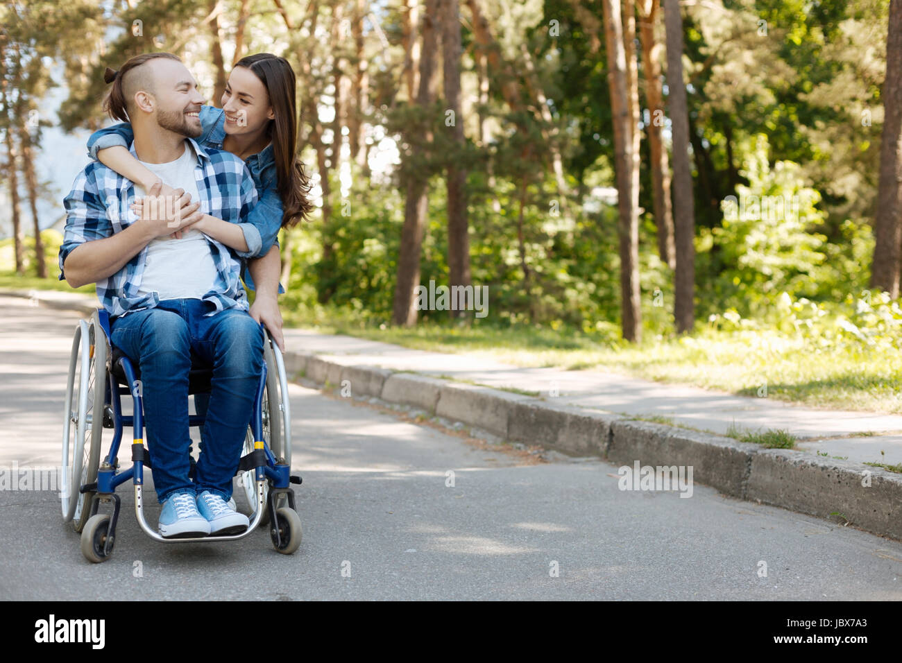 Positive young people enjoying time on the nature Stock Photo - Alamy