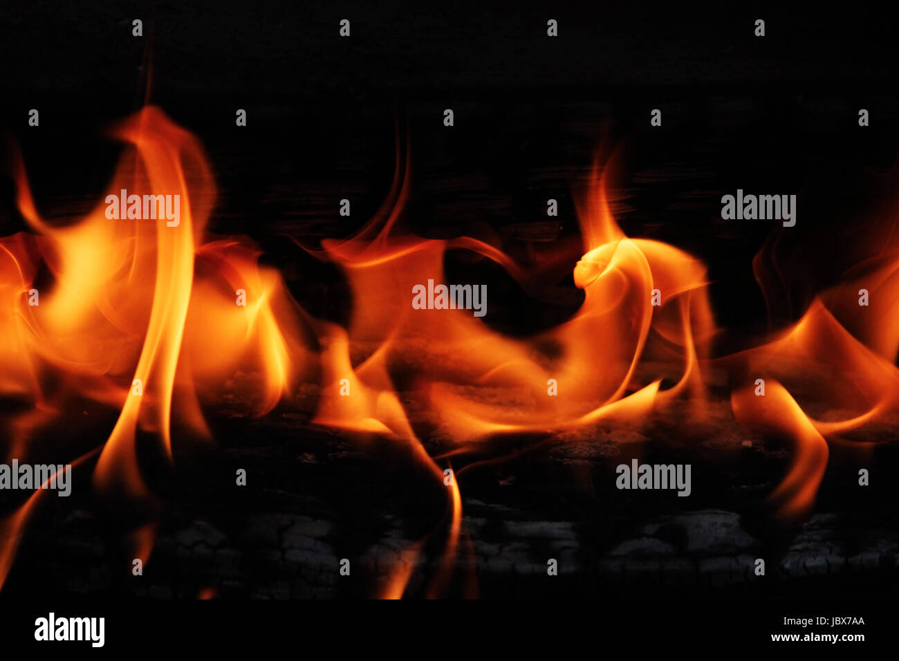 A beautiful evening fire melting away with red coals Stock Photo - Alamy